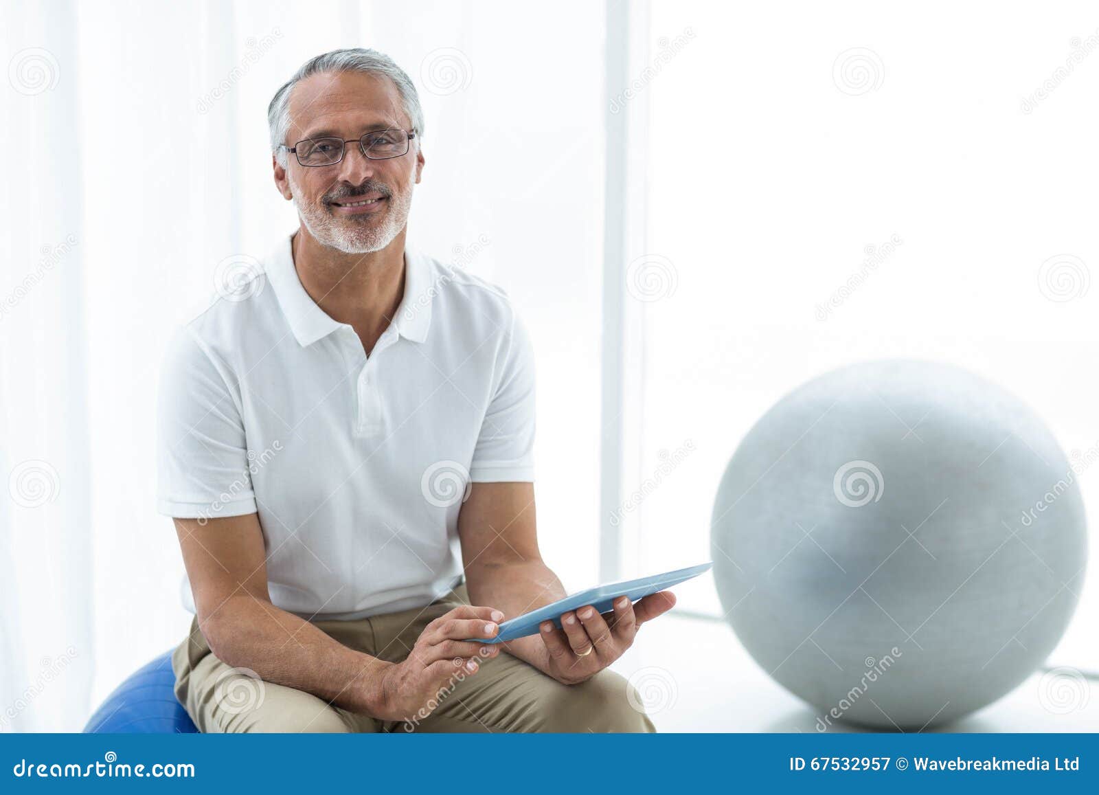 Physiotherapist Using Digital Tablet Stock Image - Image of active ...