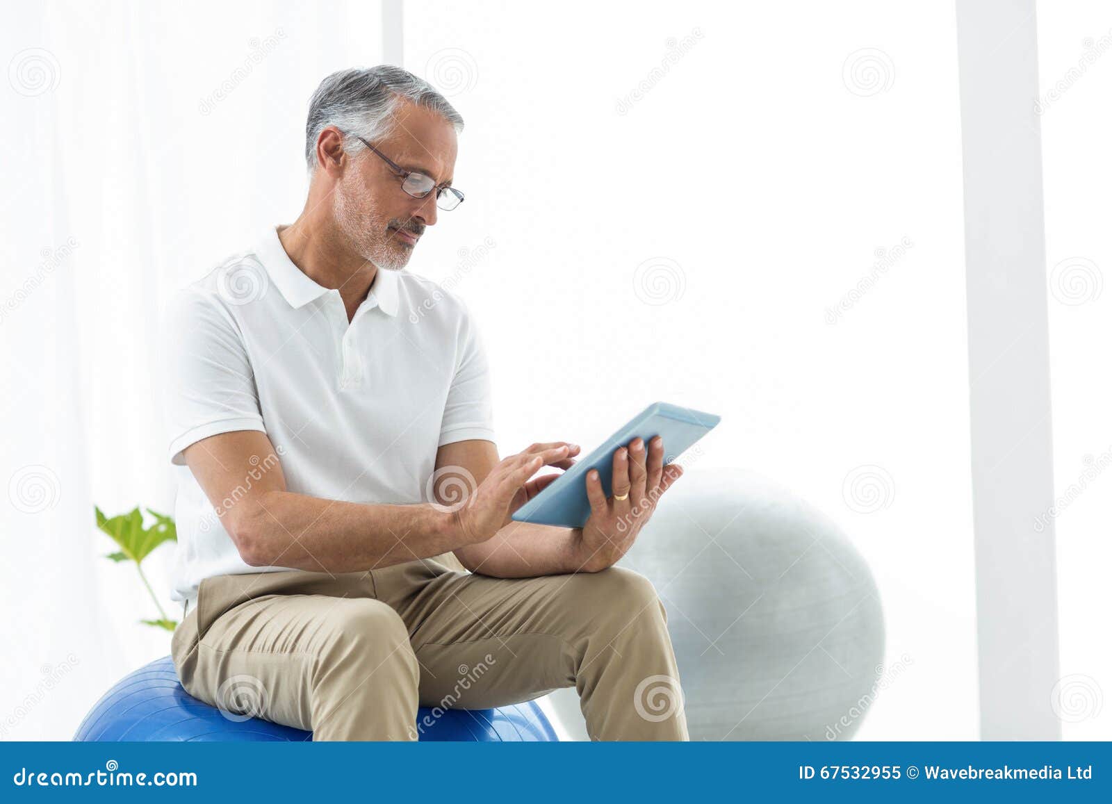 Physiotherapist Using Digital Tablet Stock Image - Image of exercise ...