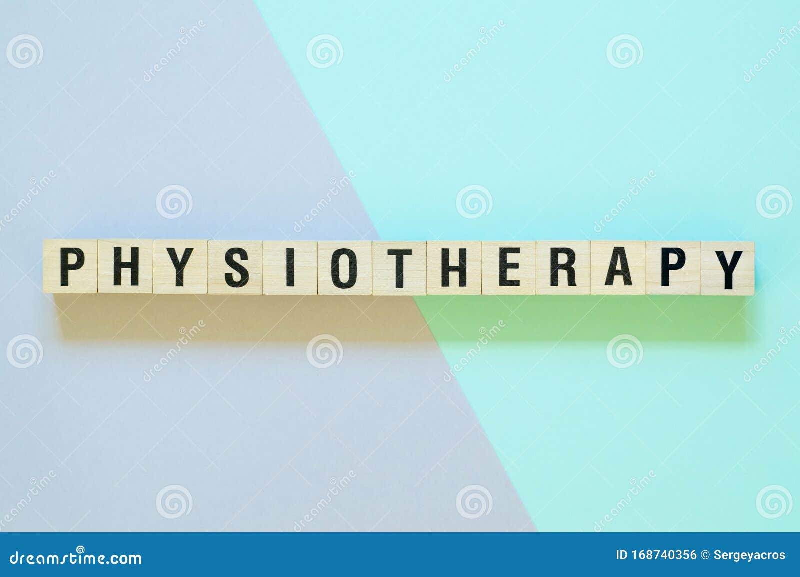 The Word Physiotherapy On A Blue Background. The Concept Of Treating A ...