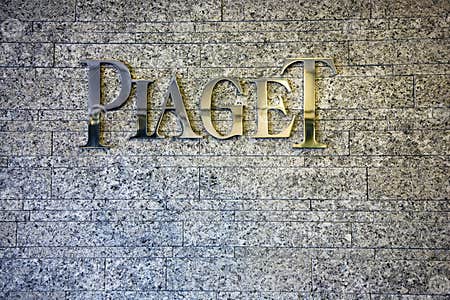 Piaget logo against wall editorial image. Image of swiss - 19529475