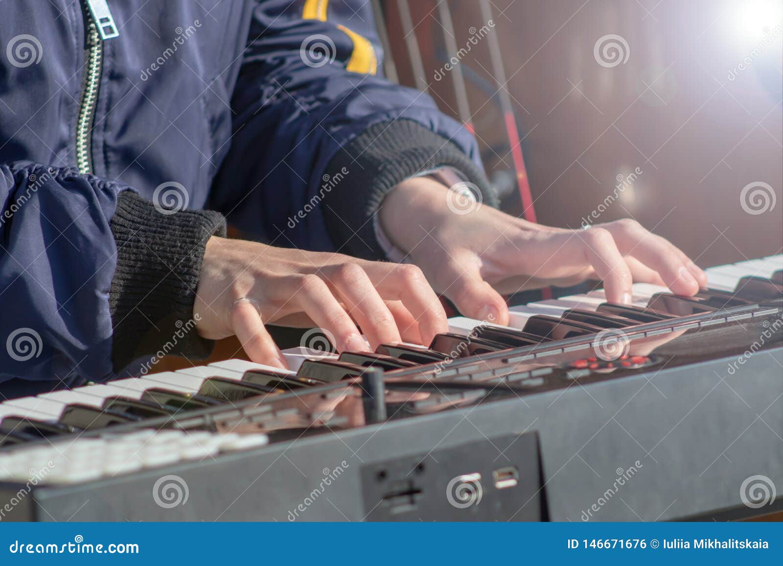 Pianist Play the Keys of the Electronic Synth at the Outdoor ...