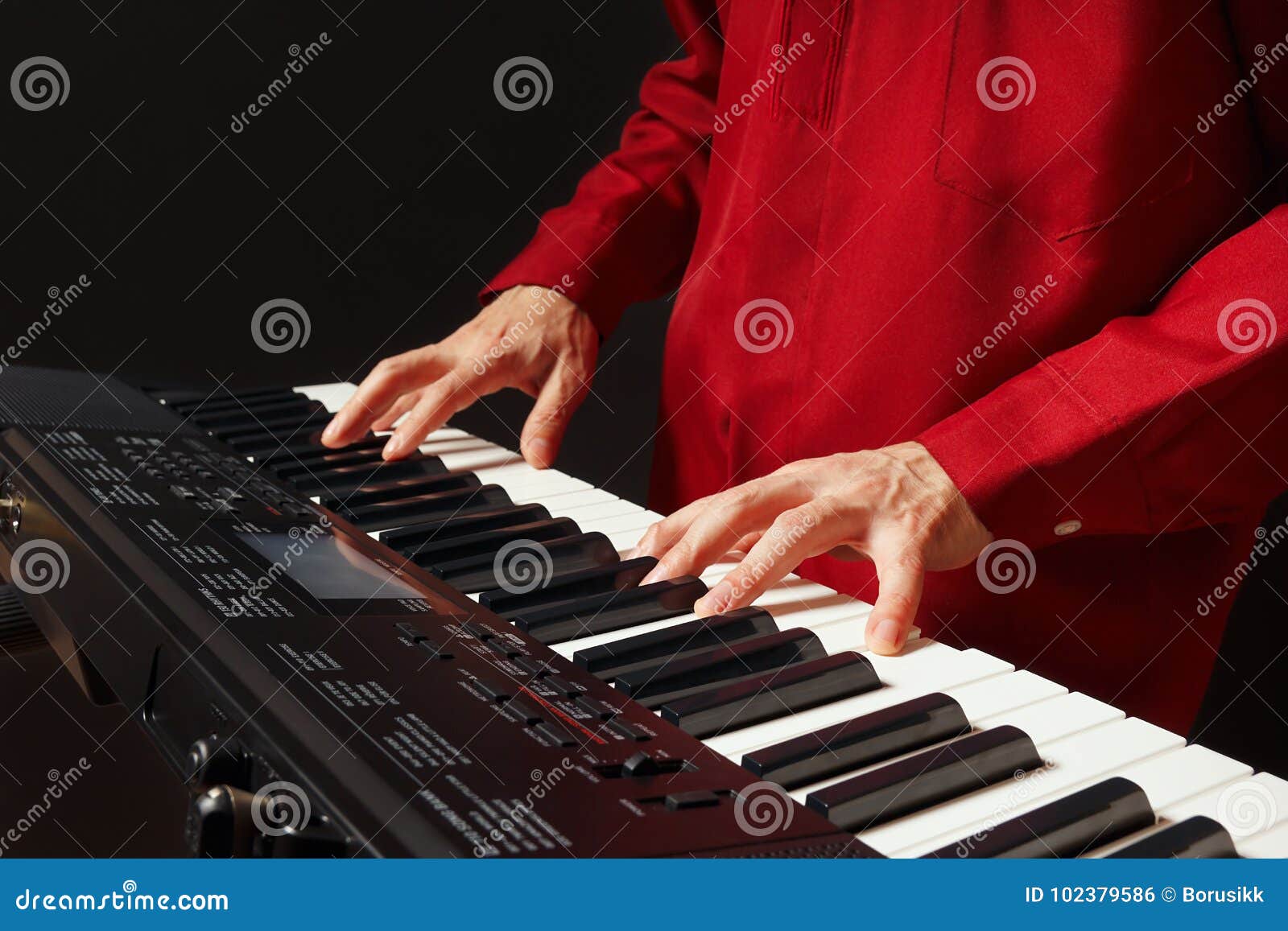 Pianist Playing the Electronic Synth on Black Background Stock Photo ...