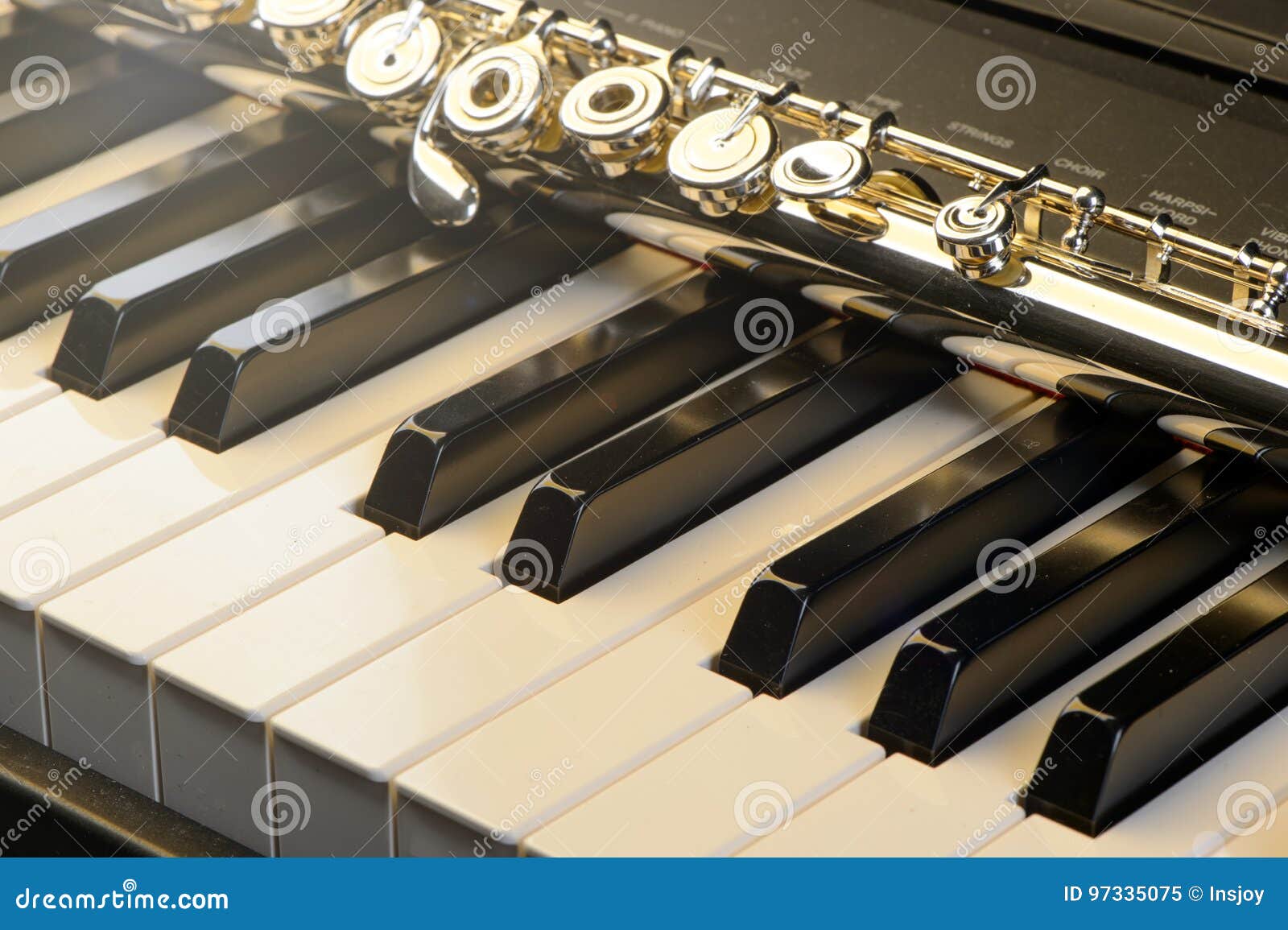 Piano and Flute with Golden Shine and Sheet Music. Horizontal ...