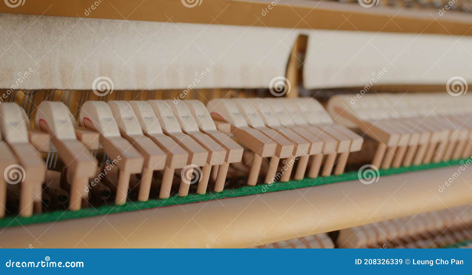 Piano hammers hit strings stock image. Image of classic - 208326339