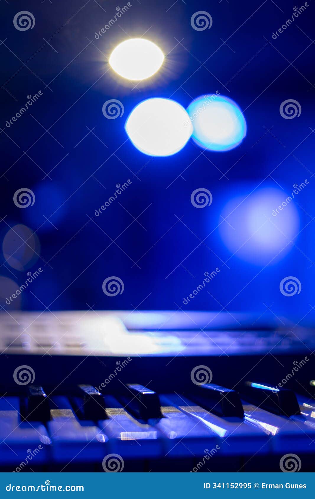 Piano Musical Keyboard on Stage with Blue Lights Stock Image - Image of ...