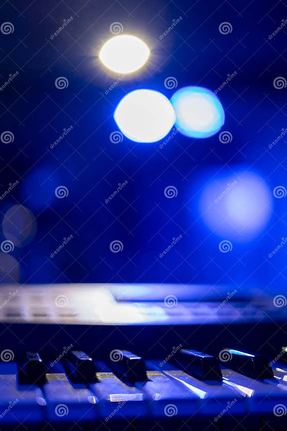 Piano Musical Keyboard on Stage with Blue Lights Stock Image - Image of ...