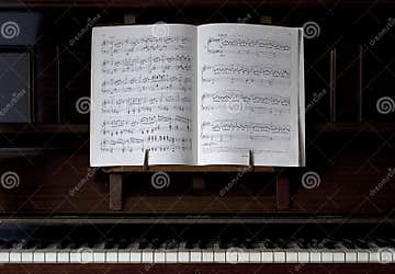 Piano and Open Sheet Music stock photo. Image of composition - 8535976