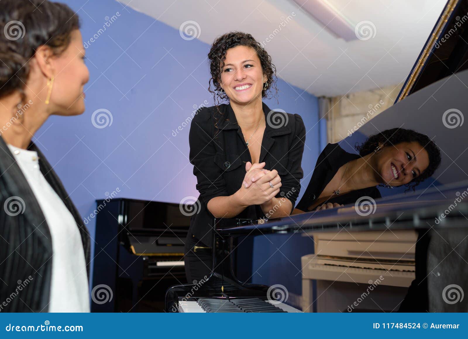 Piano player and singer stock photo. Image of female - 117484524