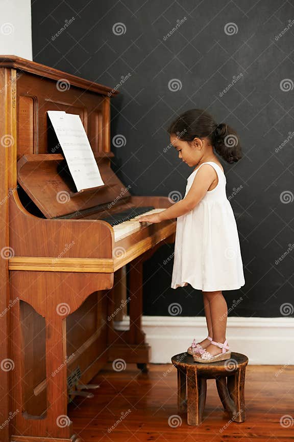 Piano, Stool and Kid in Home for Learning, Practice and Classical ...