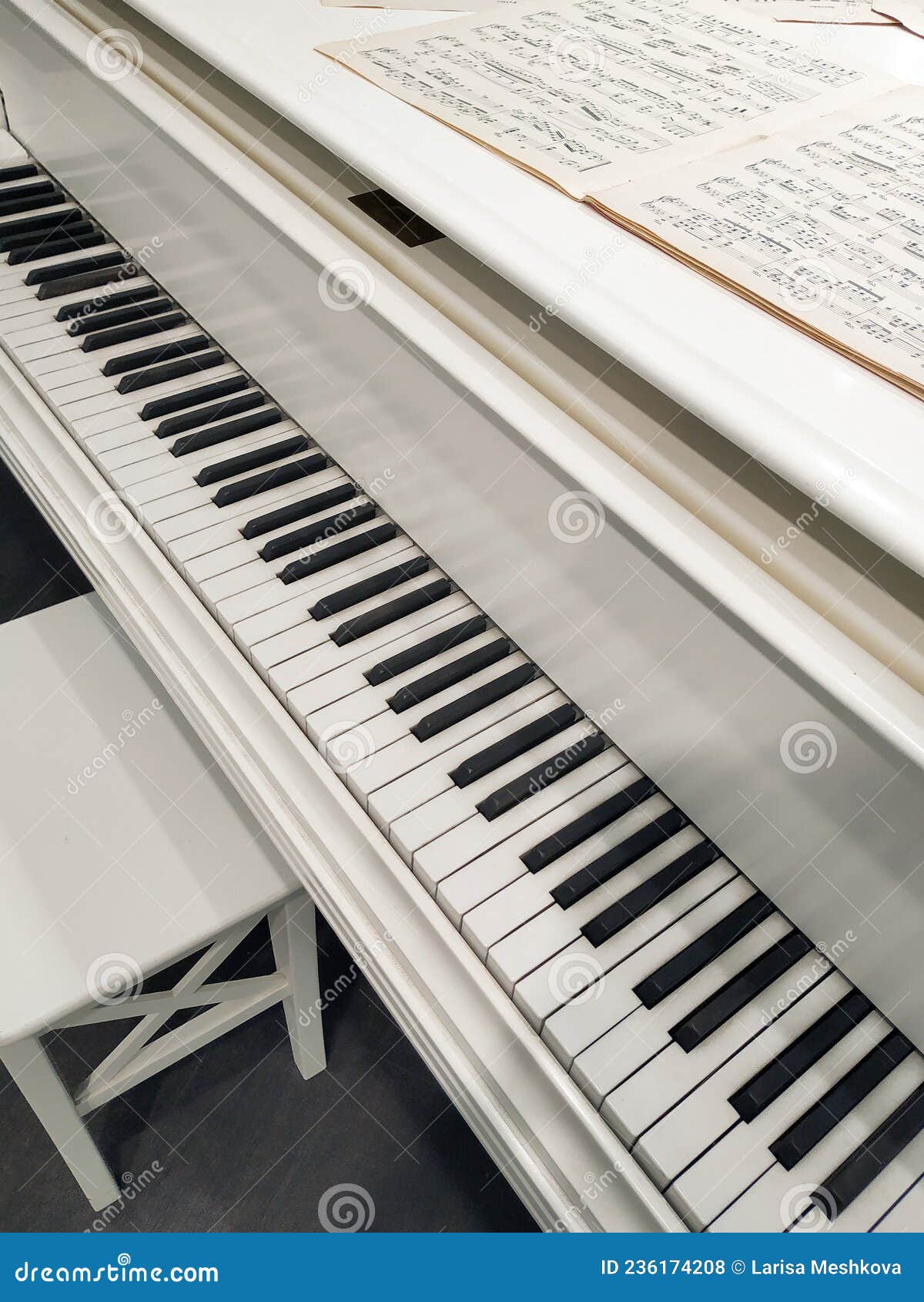 The Piano is White, with Black and White Keys, with Notes Music Stock ...