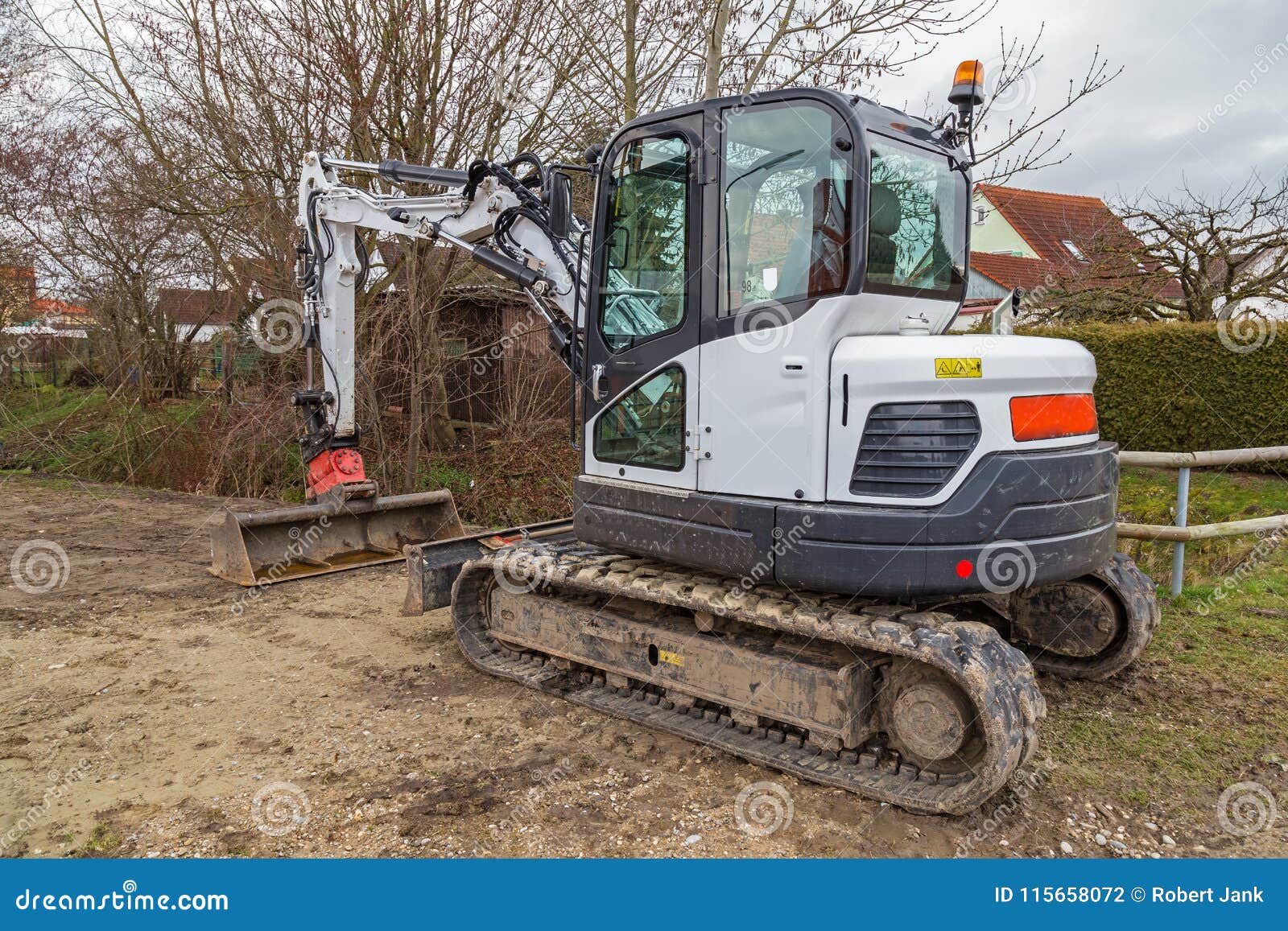 Piccolo escavatore fotografia stock. Immagine di commercio - 115658072