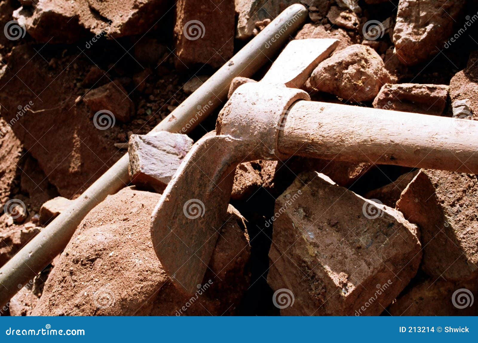 Pick axe and rocks stock photo. Image of manual, crack - 213214