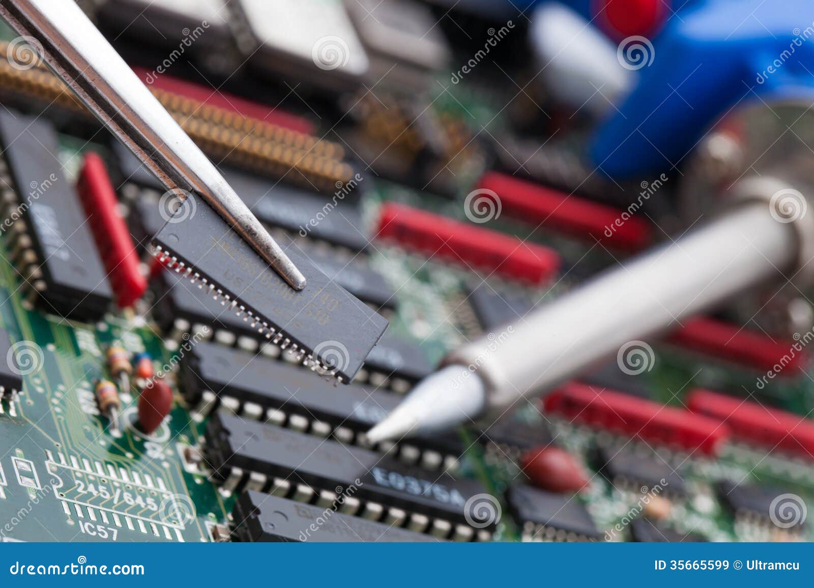 Pick IC with pliers stock image. Image of electrical - 35665599