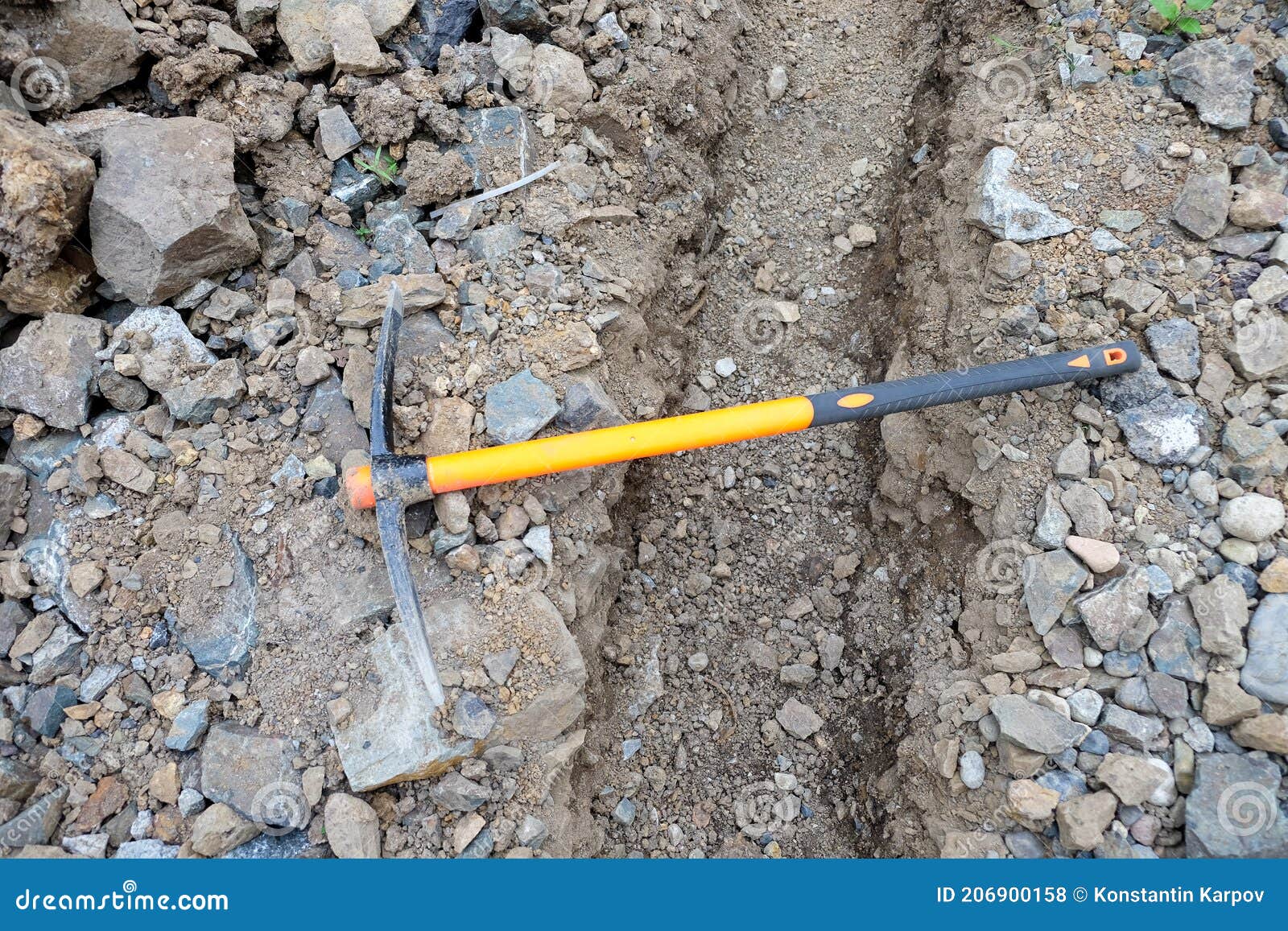 Pickaxe Hoe Lying On The Ground. Hand-held Percussion Tool Designed For ...