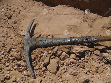 Pickaxe Lying in Dirt - Horizontal Stock Photo - Image of clumps ...