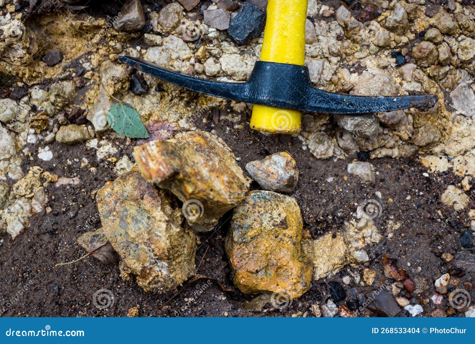 Pickaxe and Rough Stones Collected for the Collection Stock Photo ...