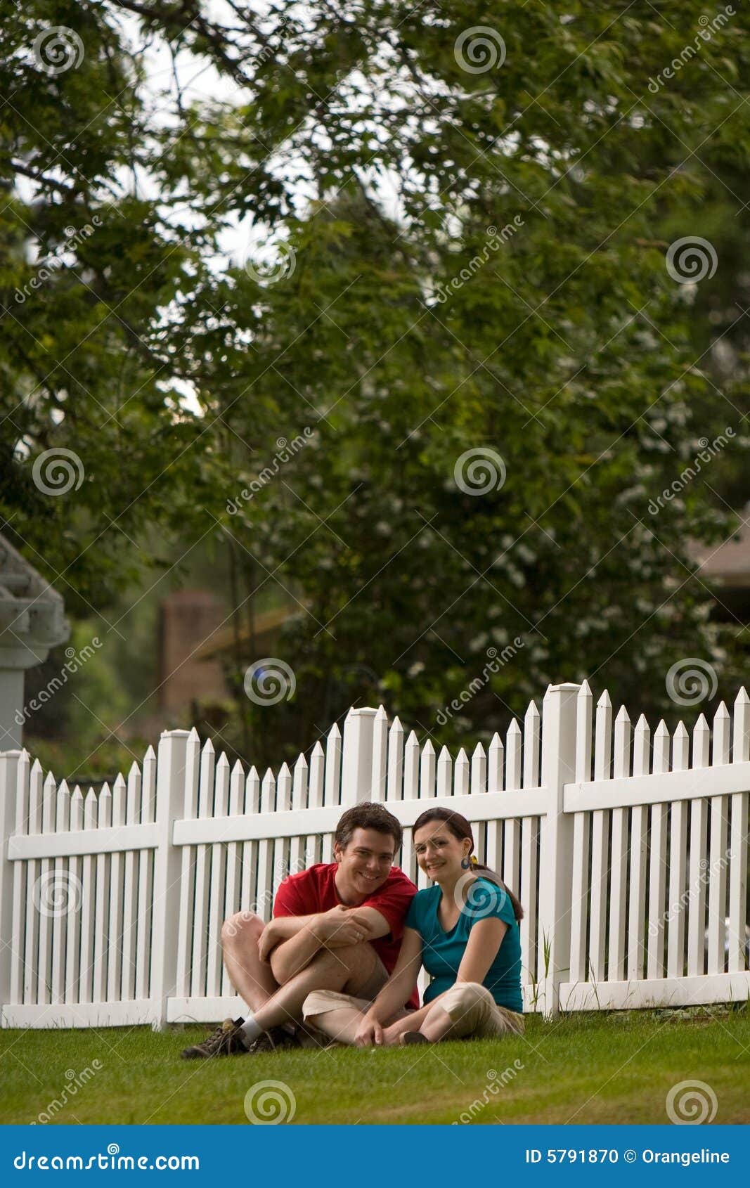 Picket Fence Couple-Vertical Stock Photo - Image of lawn, fence: 5791870