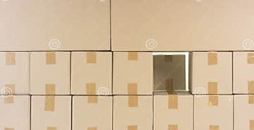 Picking a Box Out of Stack of Cardboard Boxes with Goods in a Warehouse ...