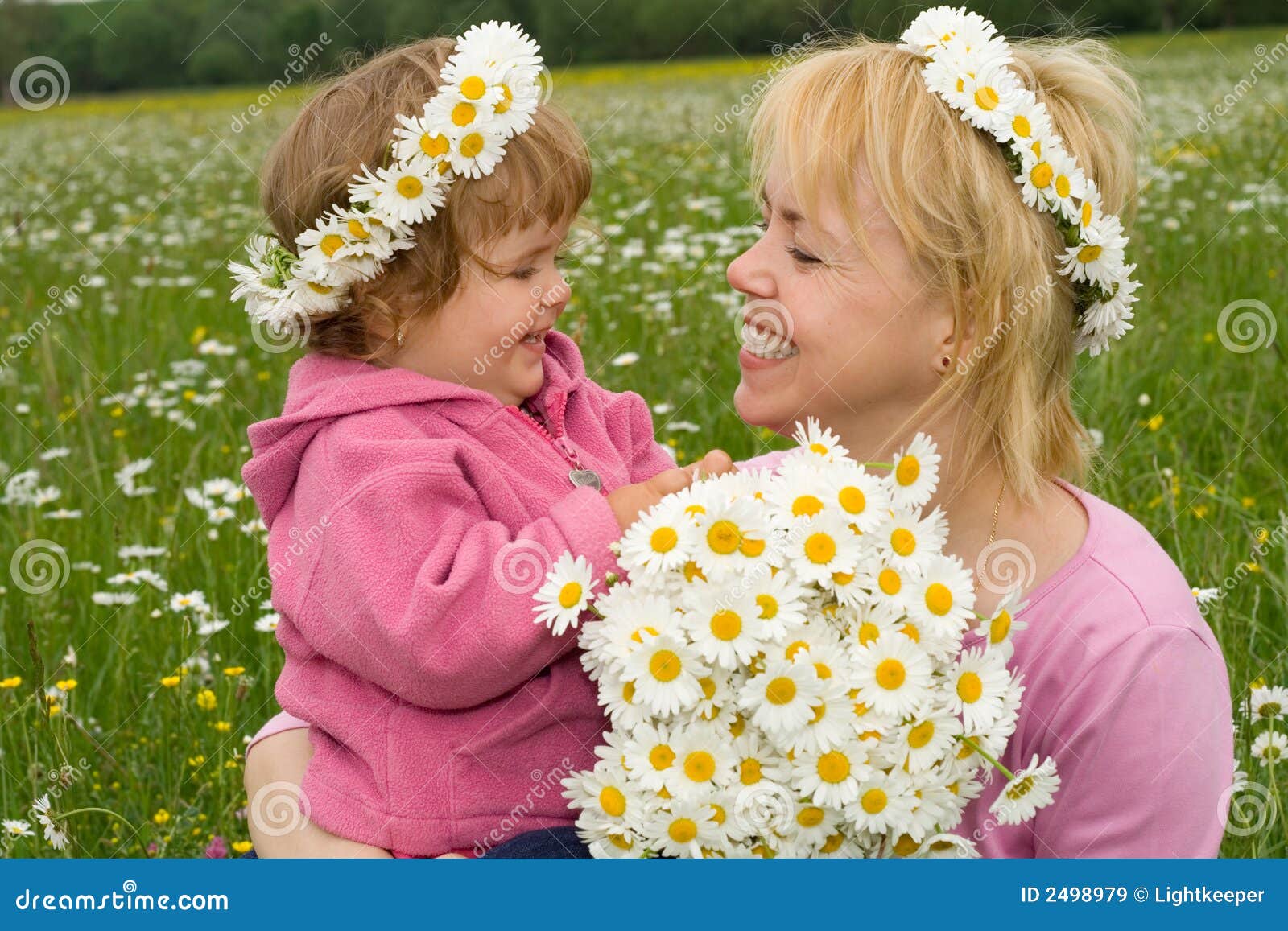 Picking flowers with mom stock image. Image of beautiful - 2498979