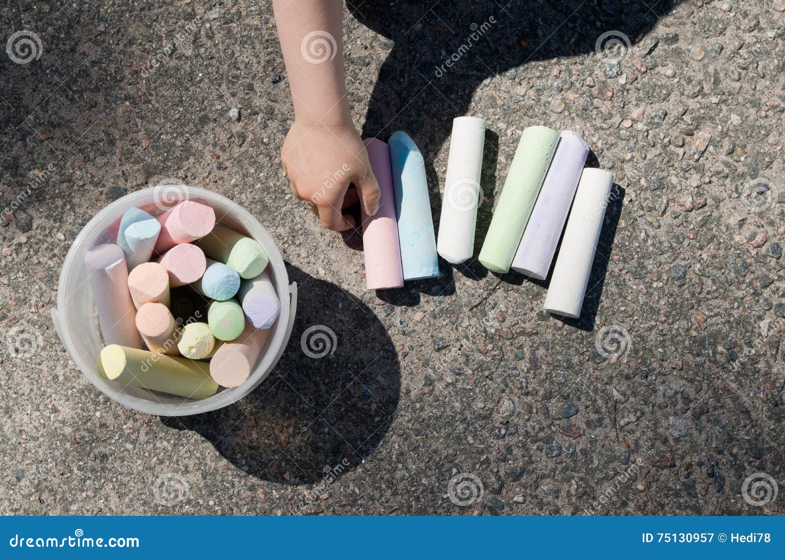 Picking a sidewalk chalk stock image. Image of childhood - 75130957