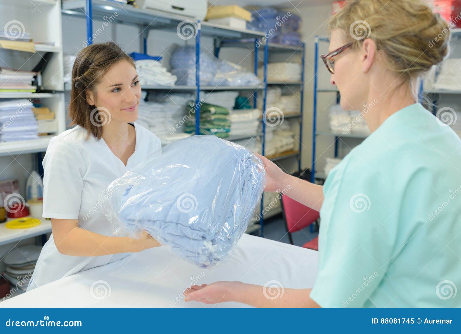Picking up clean laundry stock image. Image of commercial - 88081745