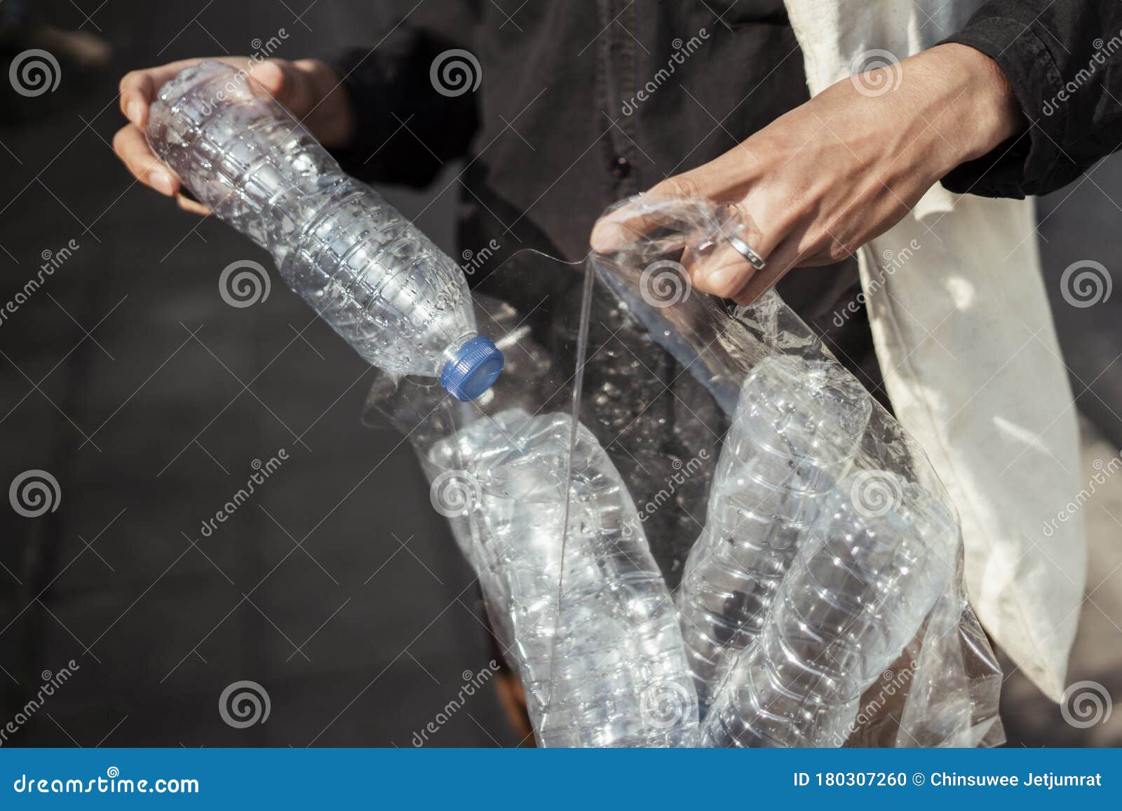 Picking up plastic bottle stock photo. Image of gourmet - 180307260