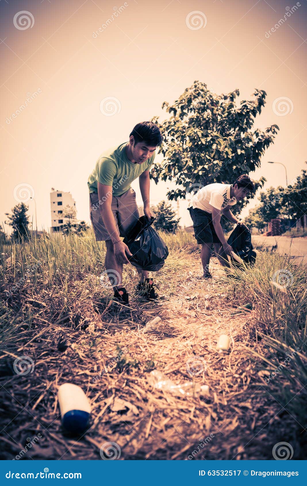 Picking up trash stock image. Image of people, volunteer - 63532517