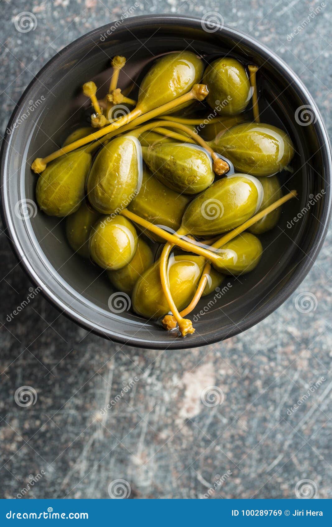 Pickled caper berries. stock image. Image of eating - 100289769