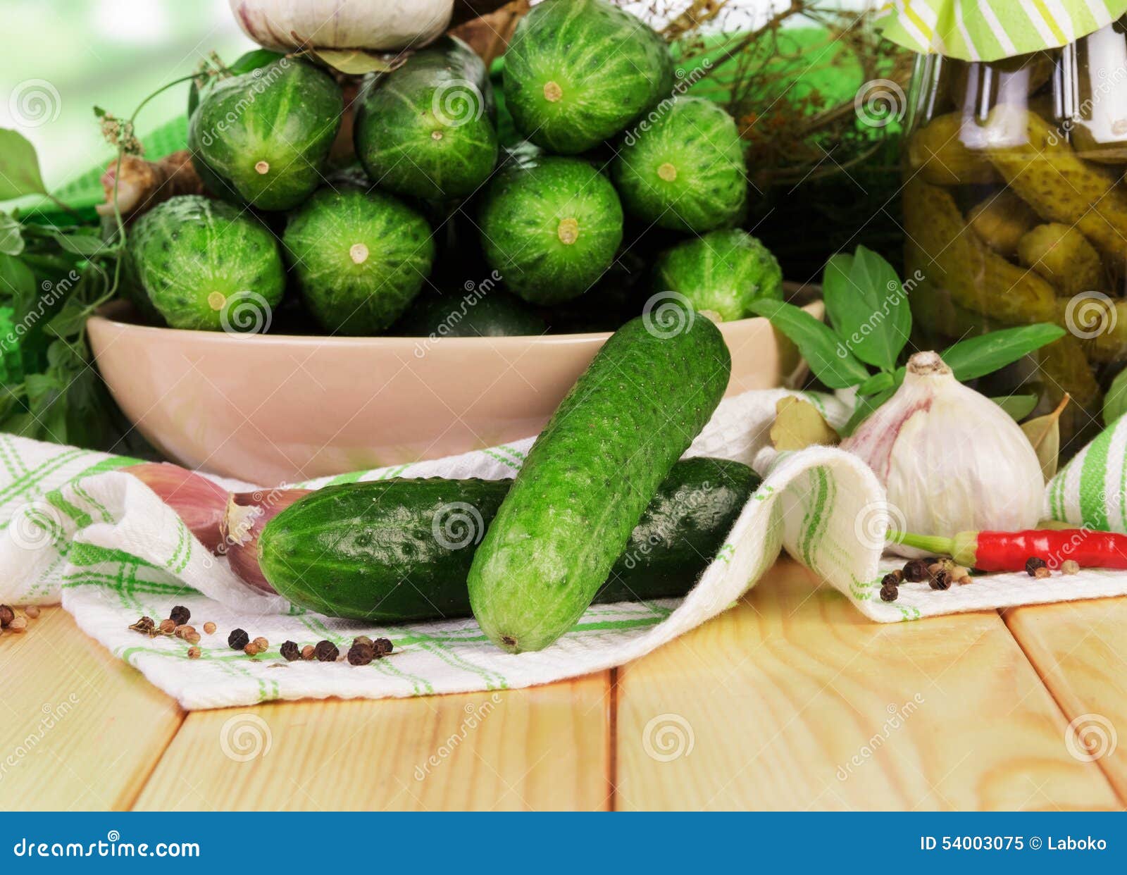 Pickled and Fresh Cucumbers on Kitchen Table Stock Image - Image of ...