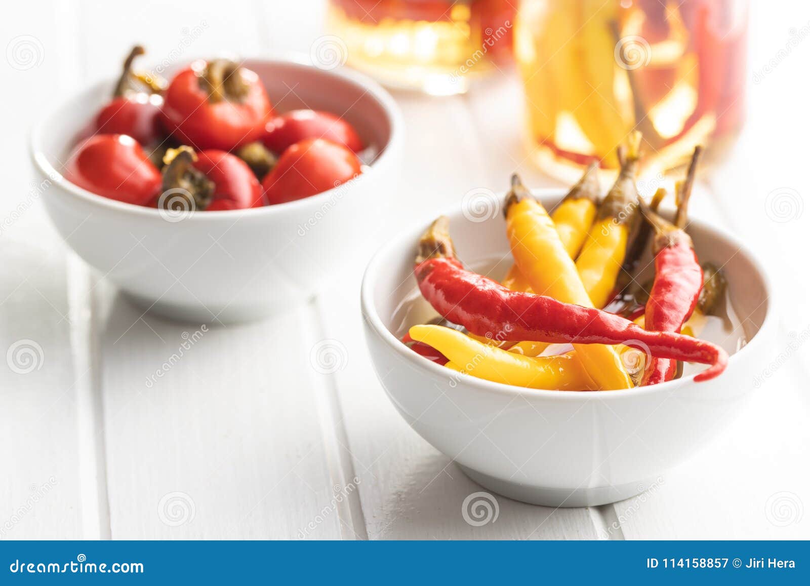 Pickled hot chili peppers. stock image. Image of flavor - 114158857