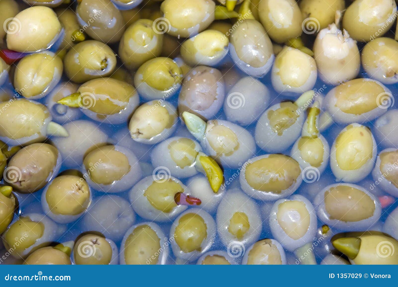 Pickled olives stock image. Image of snack, pepper, green - 1357029