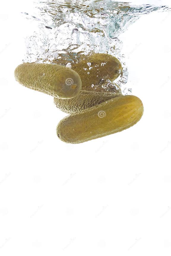 Pickles Falling into the Water Stock Photo - Image of gourmet, diet ...