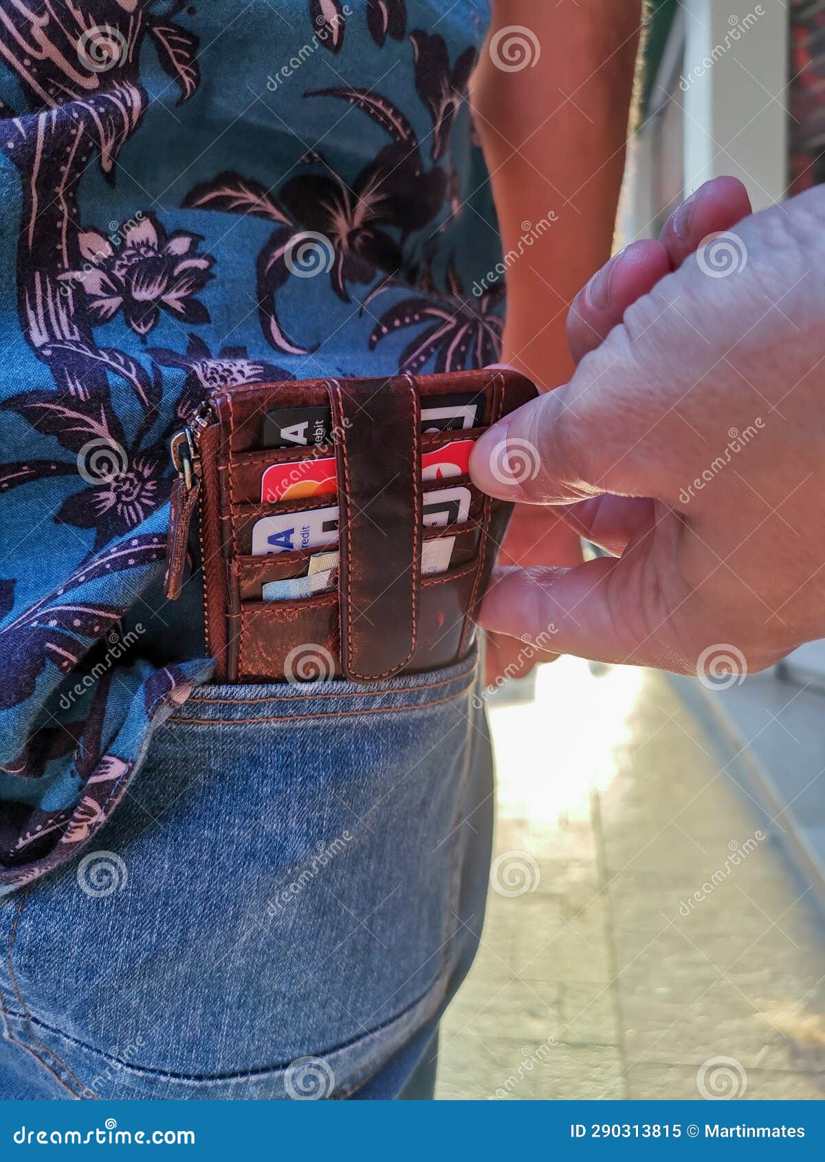 Pickpocketing, a Thief Trying To Stole a Wallet from a Back Pocket ...