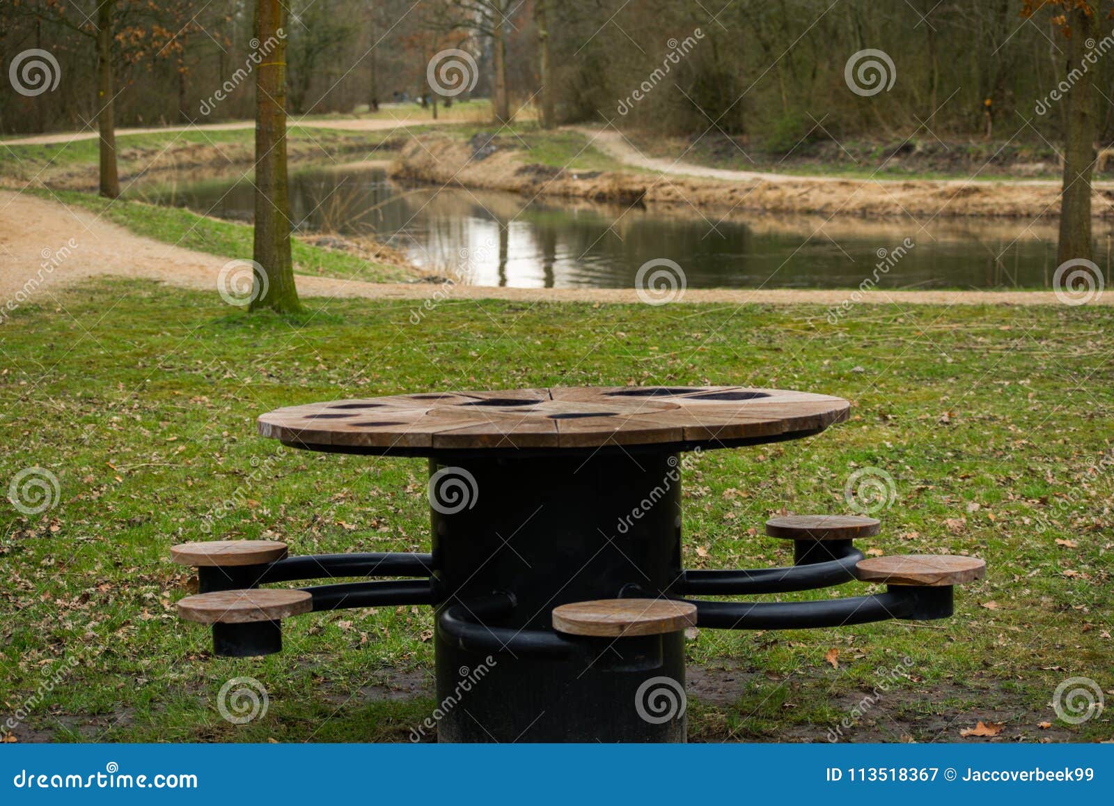 Picnic Table Bench in the Forest Nature Grass Trees Water Stock Image ...