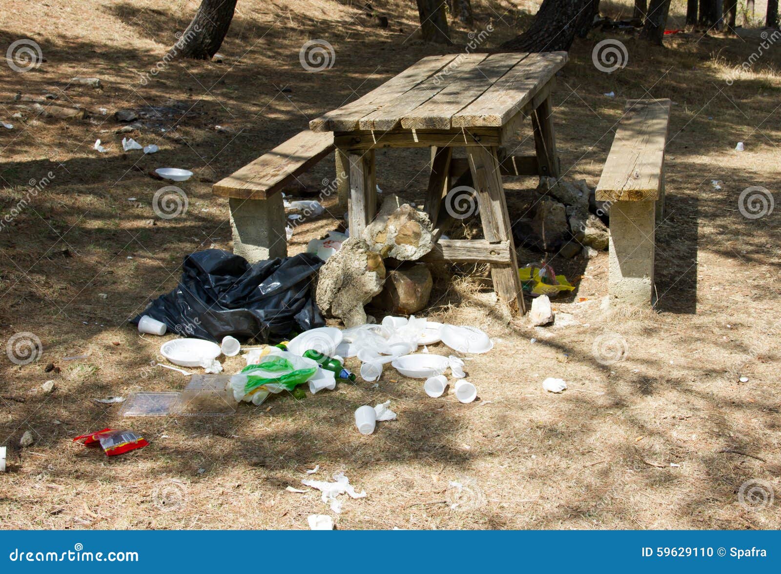 Picnic table with garbage stock photo. Image of natural - 59629110