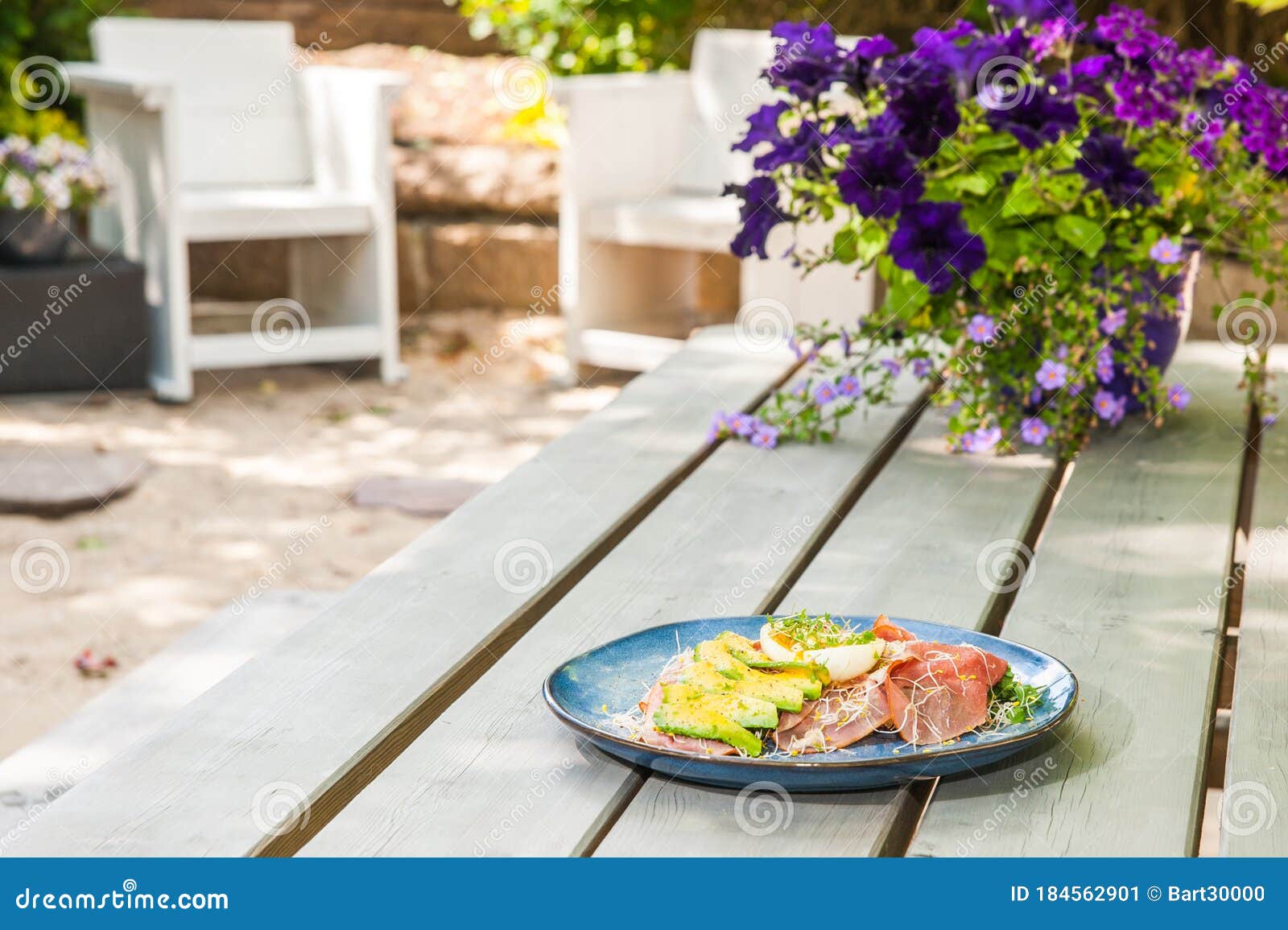 A Picnic Table with a Plate of Meat Stock Image - Image of apple ...