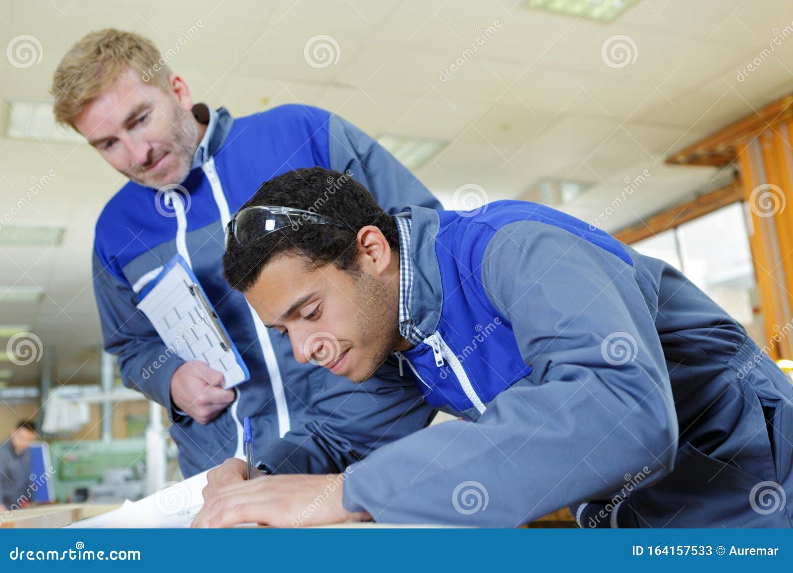 Picture Apprentice on Overalls Supervised by Instructor Stock Image ...