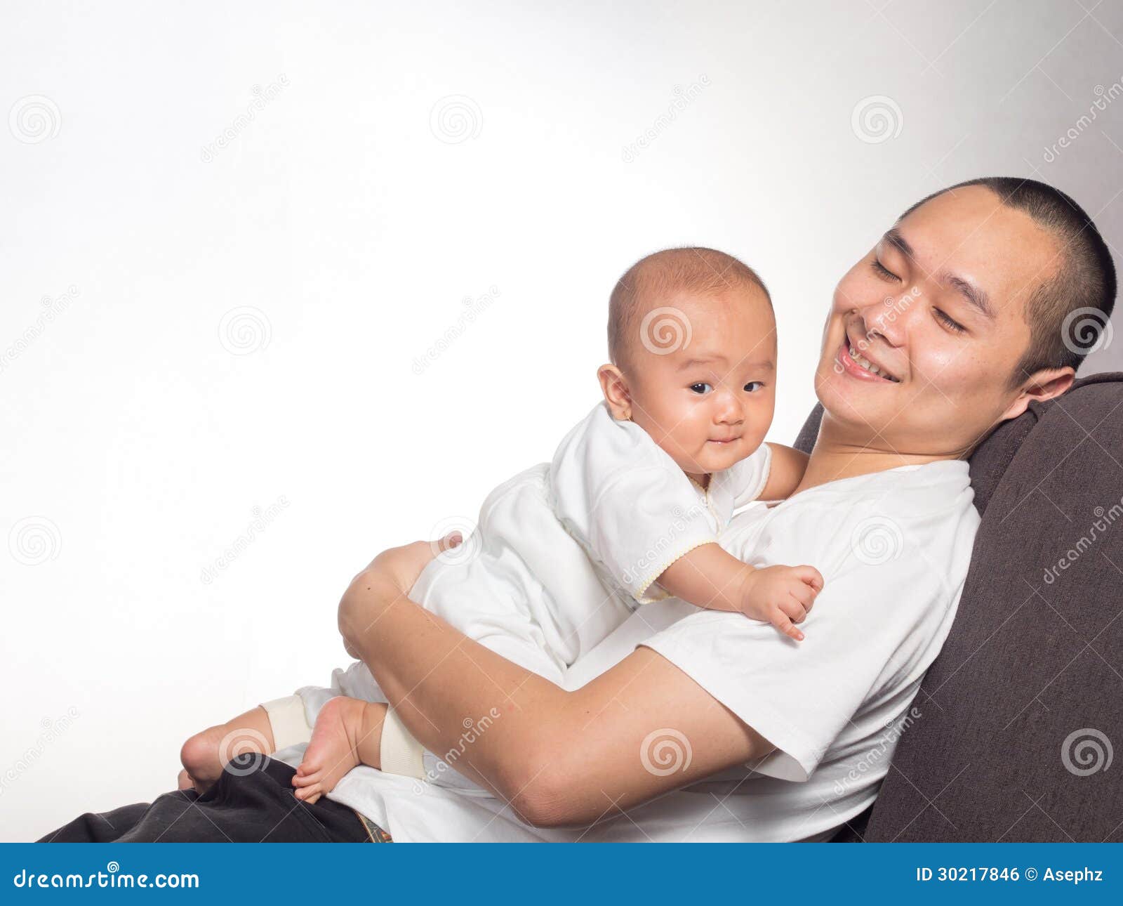 Baby and dad hugging stock photo. Image of adult, holding - 30217846
