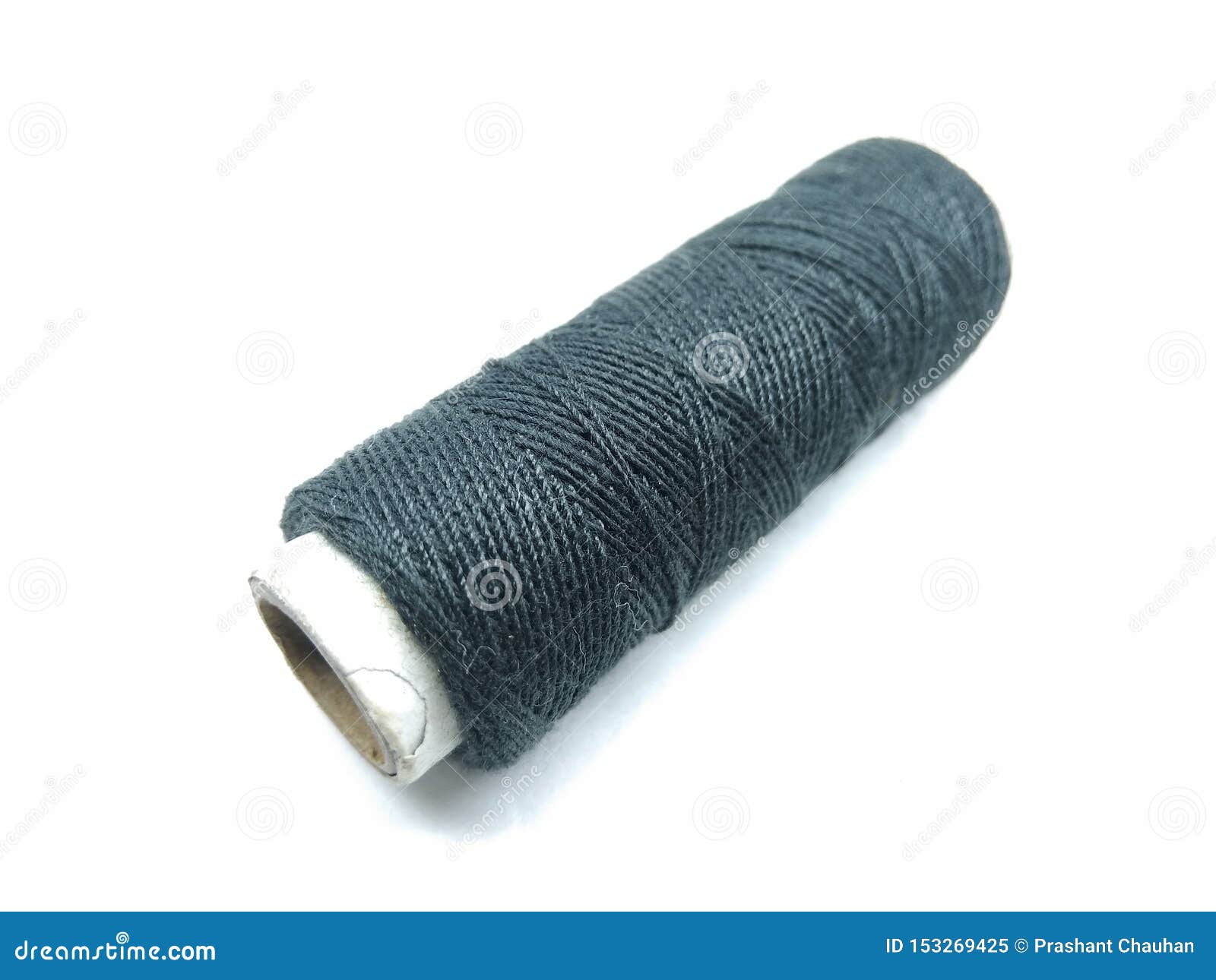 A Picture of Black Thread Roll on White Background , Stock Image ...