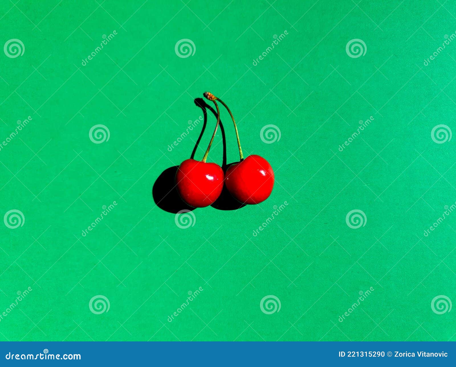 Cherry with Shadow on Light Green Background Stock Photo - Image of ...