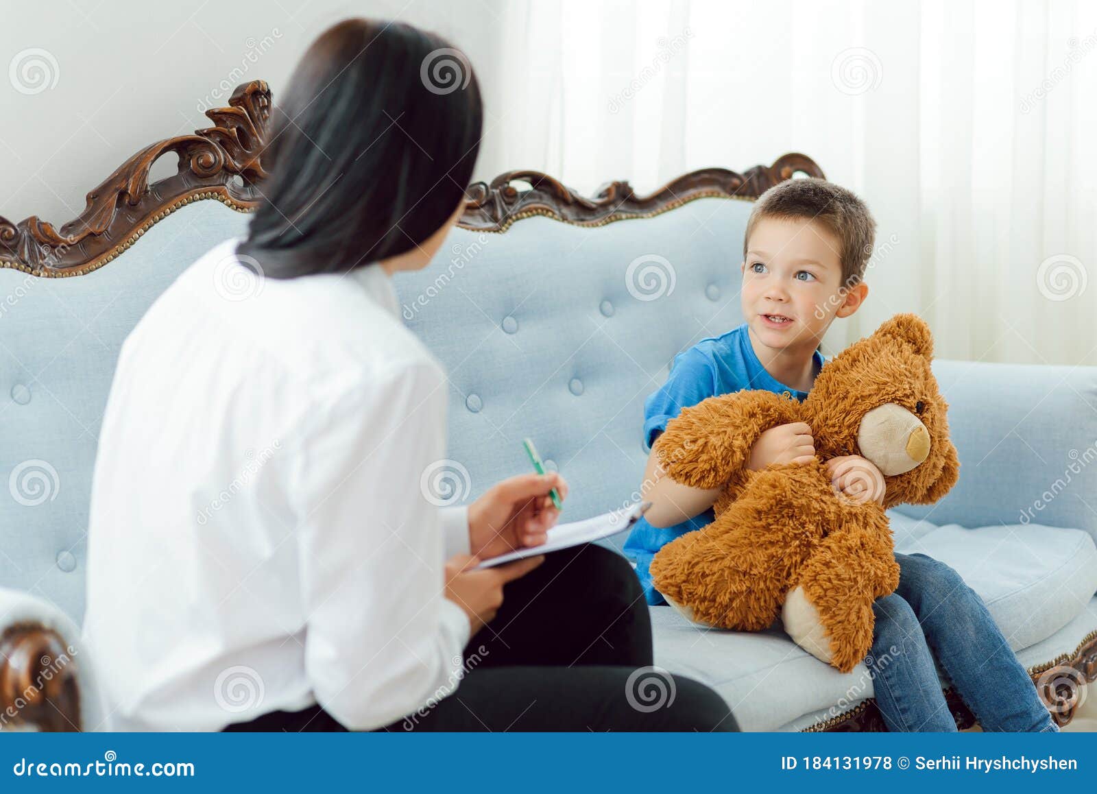 Picture of Child Psychologist Working with Young Boy in Office Stock ...
