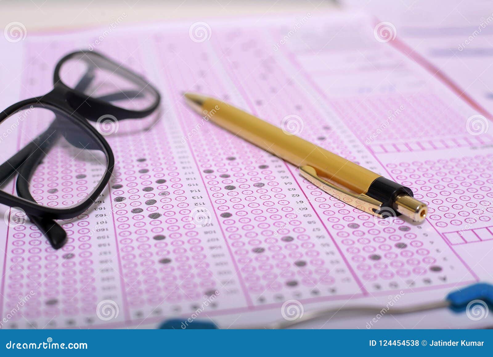 Picture of Clipboard, OMR Sheet, Pen and Glasses Stock Photo - Image of ...