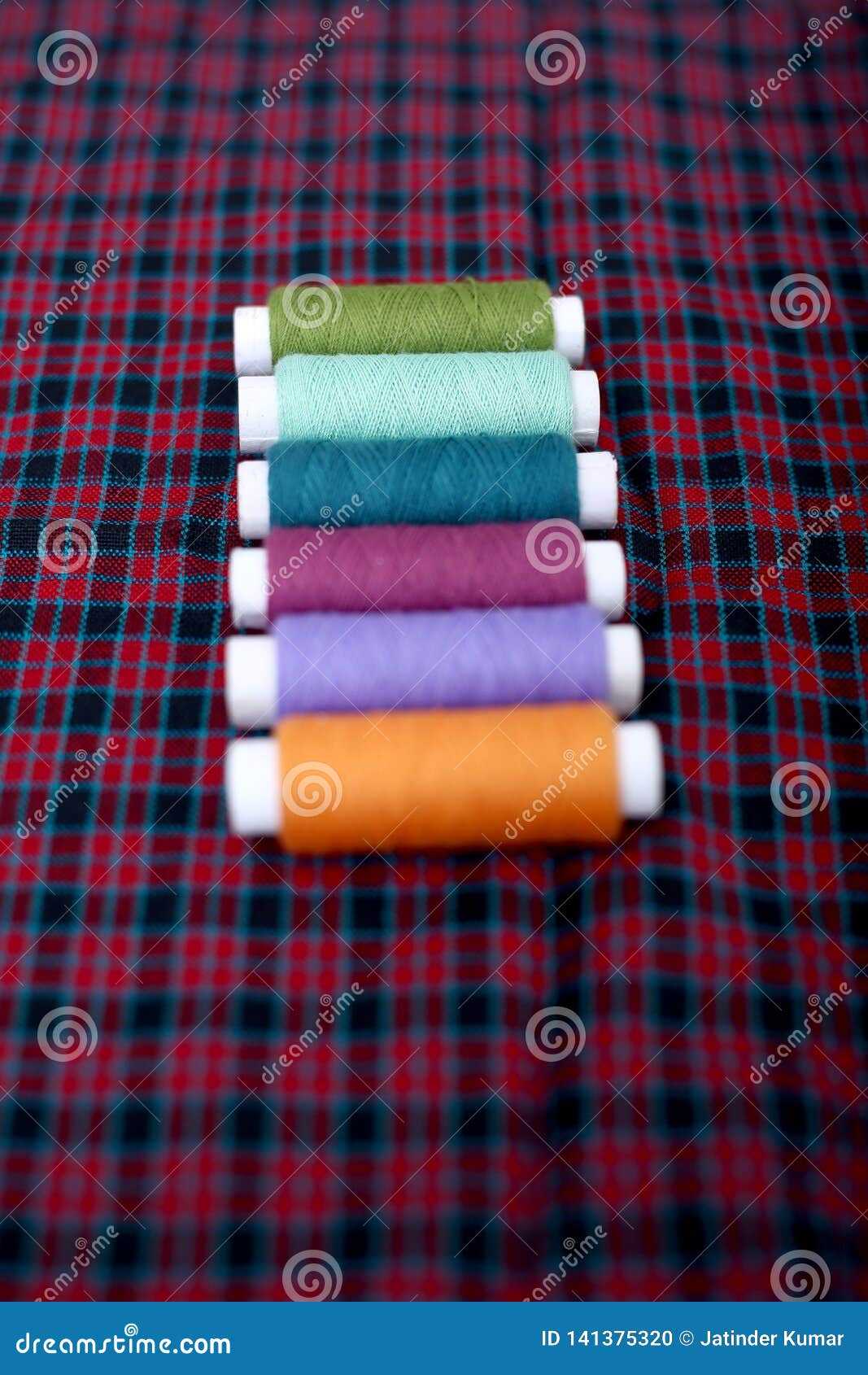 Picture of Colored Sewing Thread on the Cloth Stock Photo - Image of ...