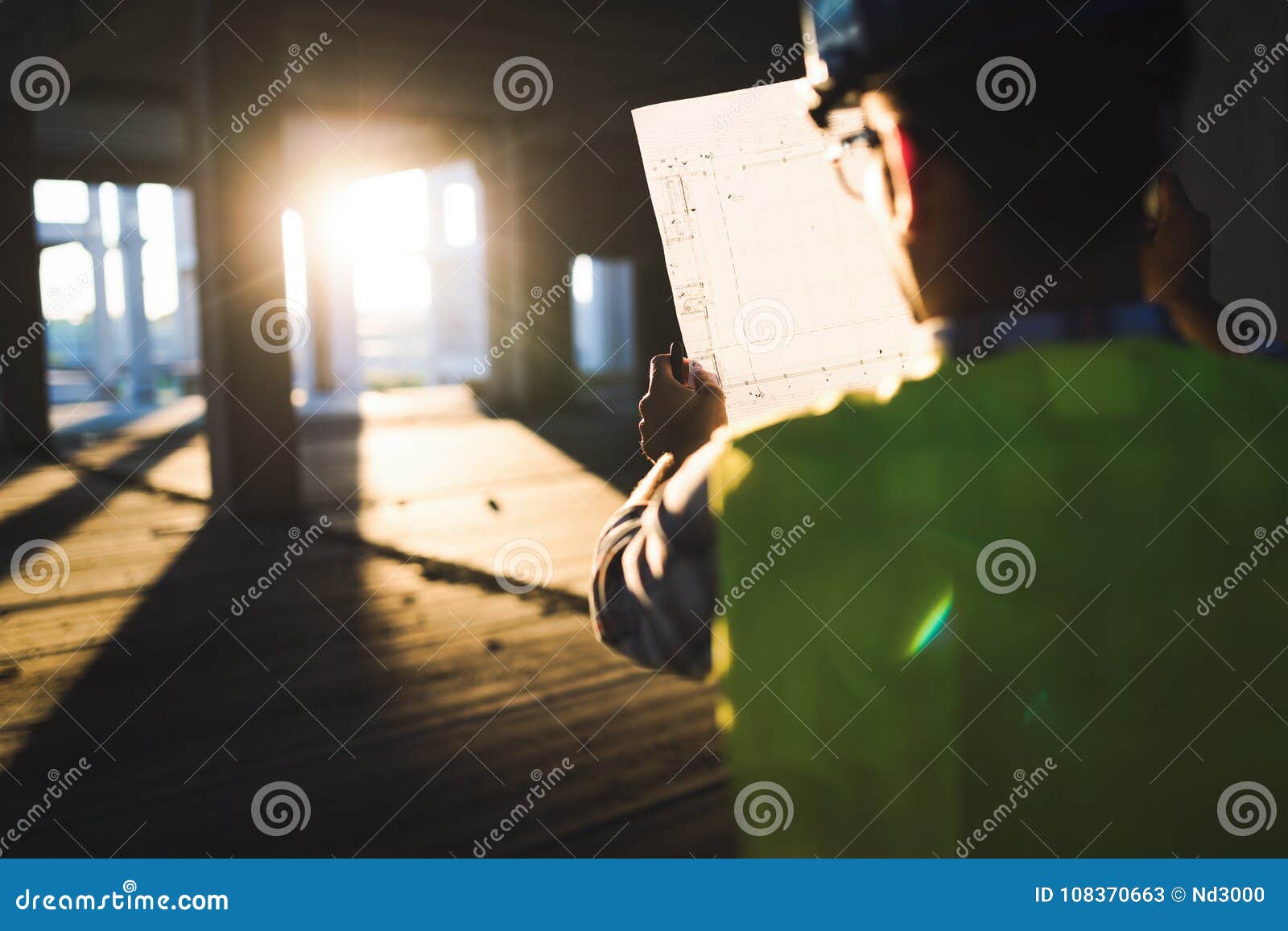 Picture of Construction Site Engineer Looking at Plan Stock Image ...