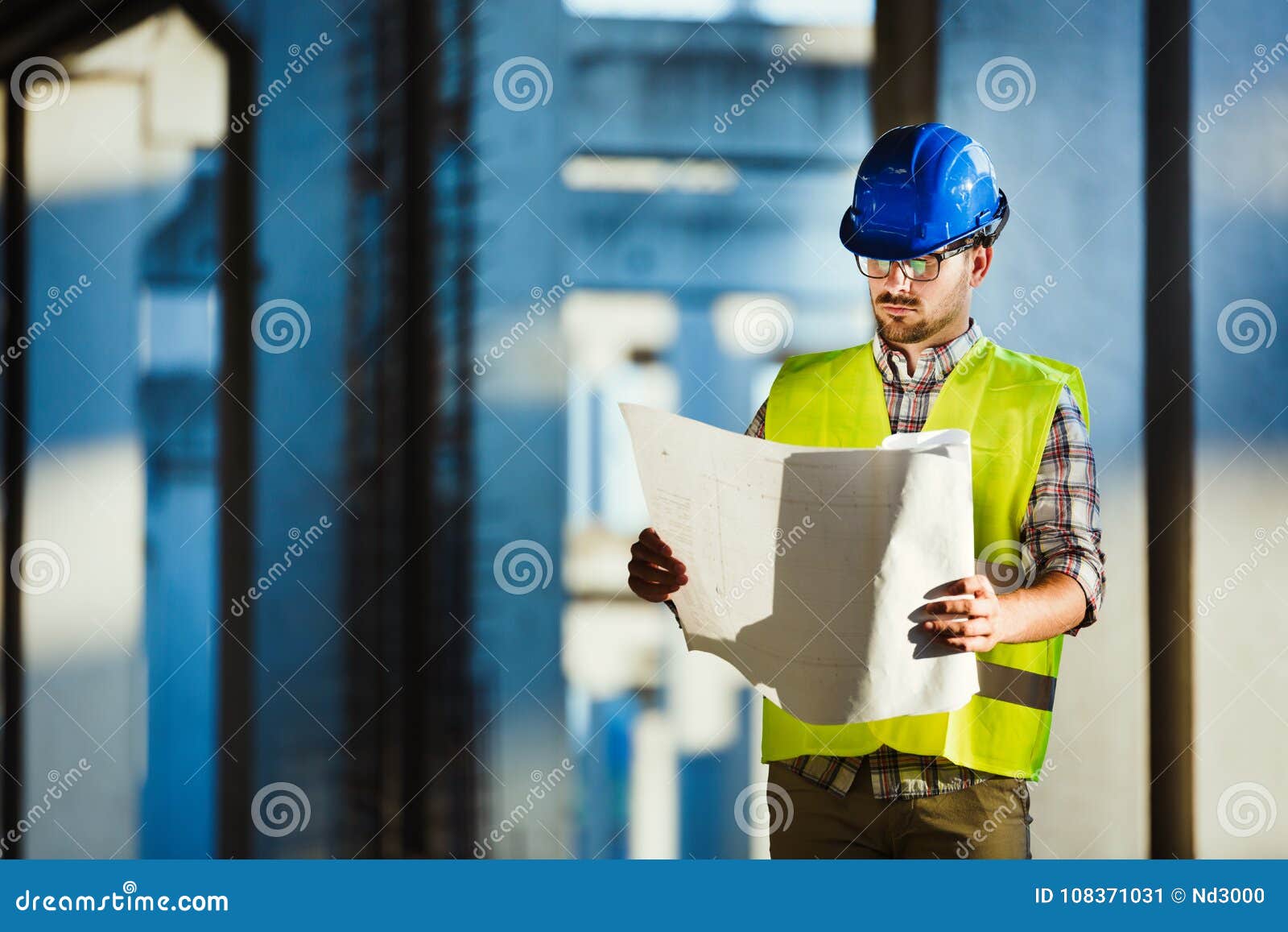 Picture of Construction Site Engineer Looking at Plan Stock Image ...