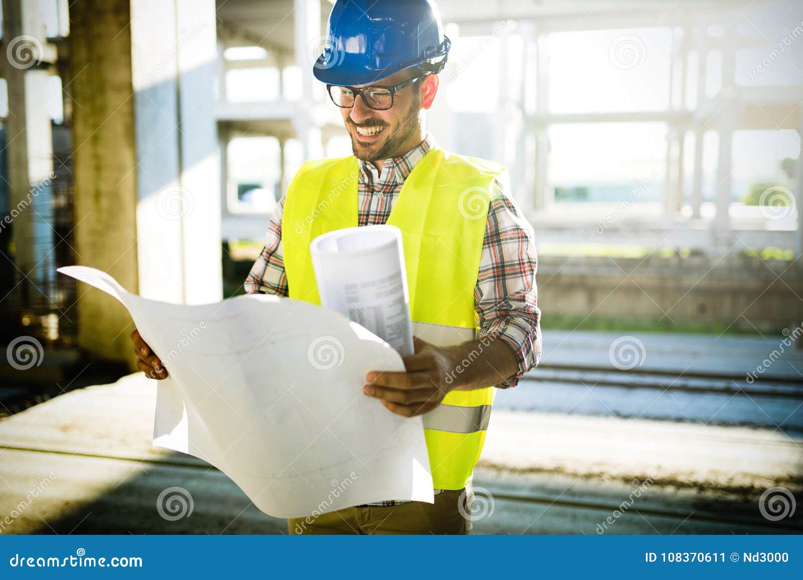 Picture of Construction Site Engineer Looking at Plan Stock Image ...