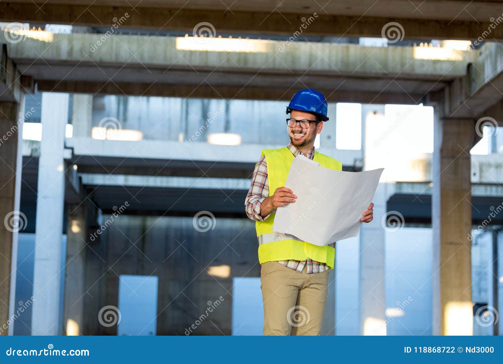 Picture of Construction Site Engineer Looking at Plan Stock Photo ...