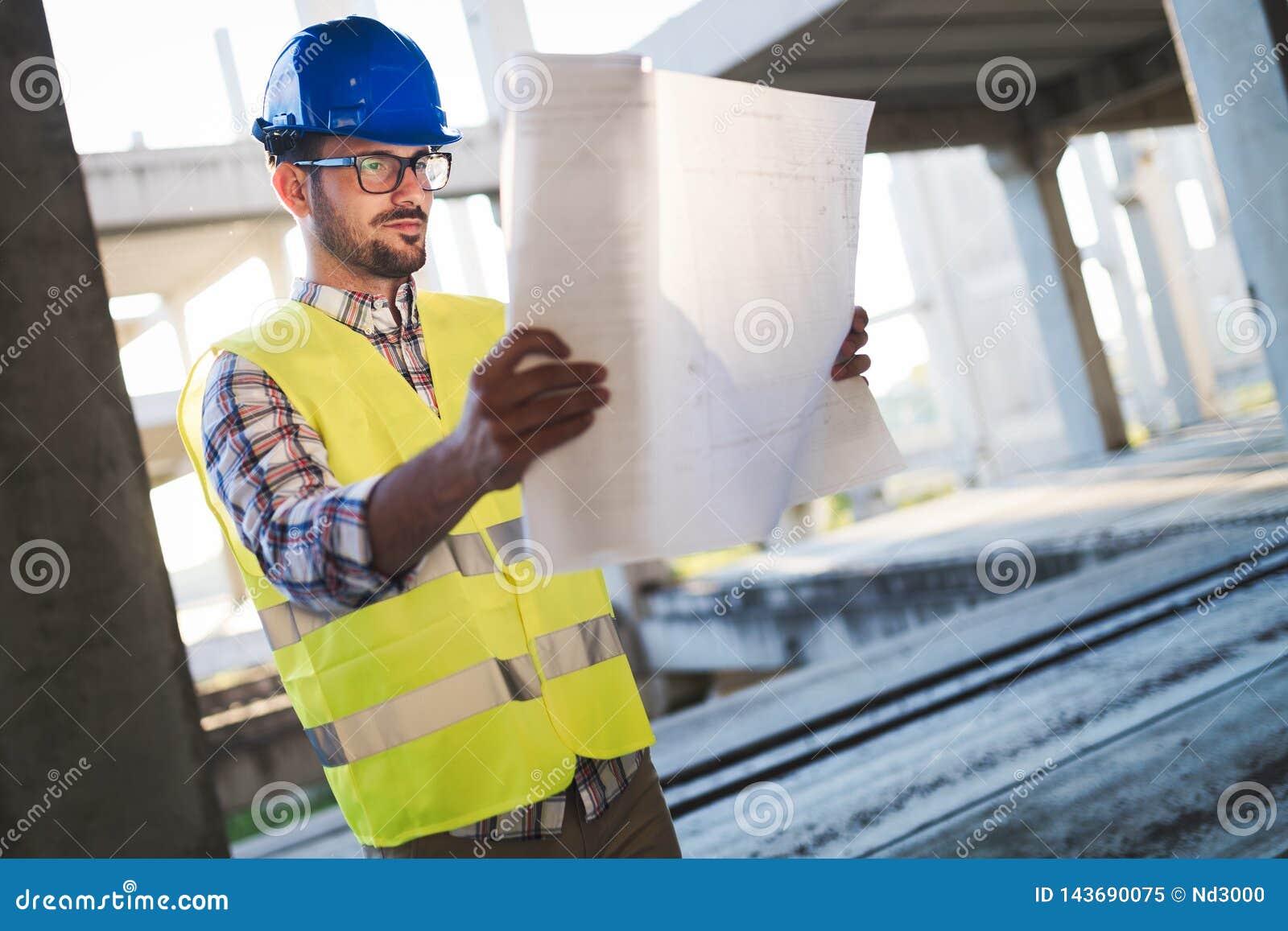Picture of Construction Site Engineer Looking at Plan Stock Image ...