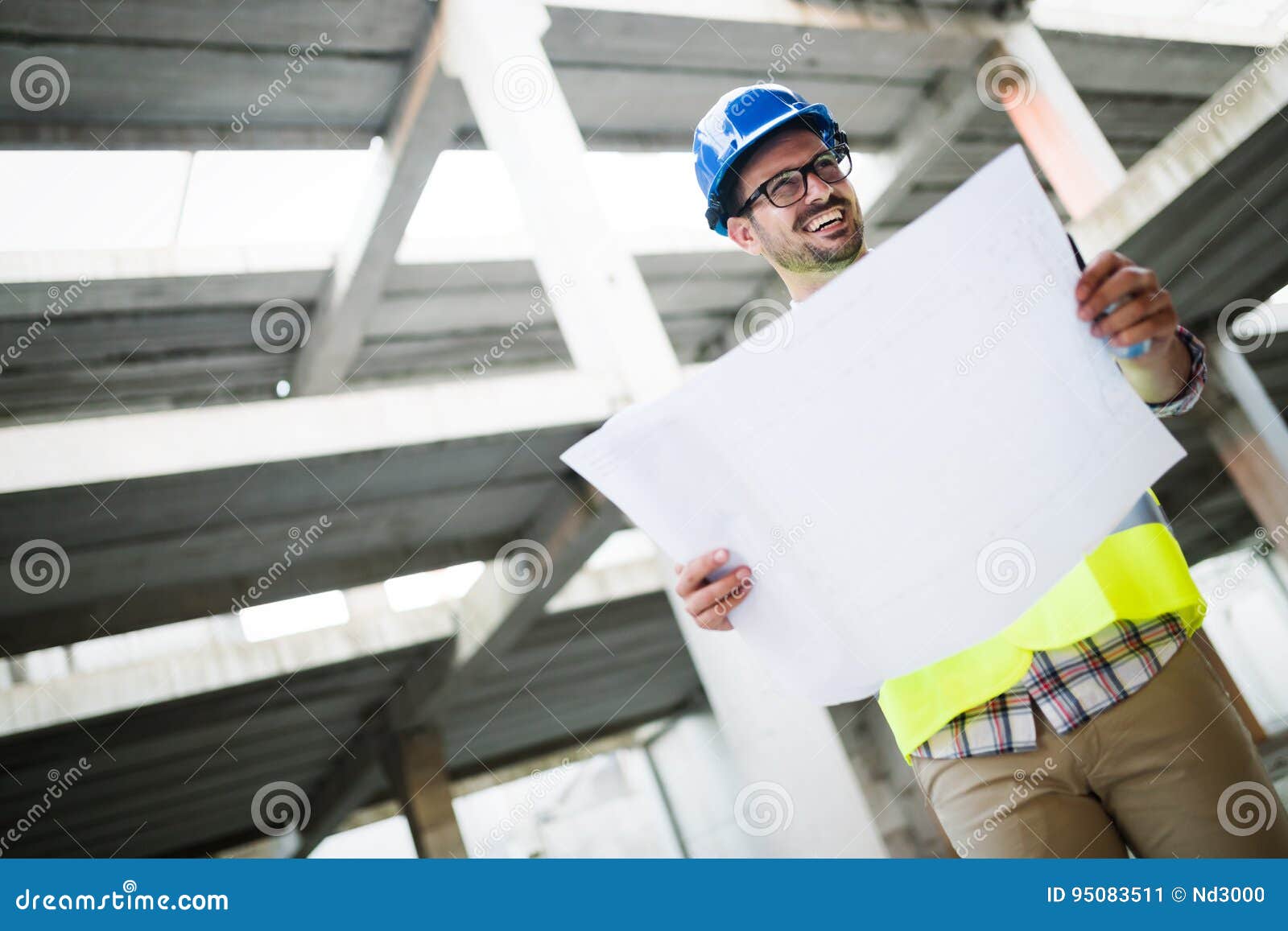 Picture of Construction Site Engineer Looking at Plan Stock Image ...