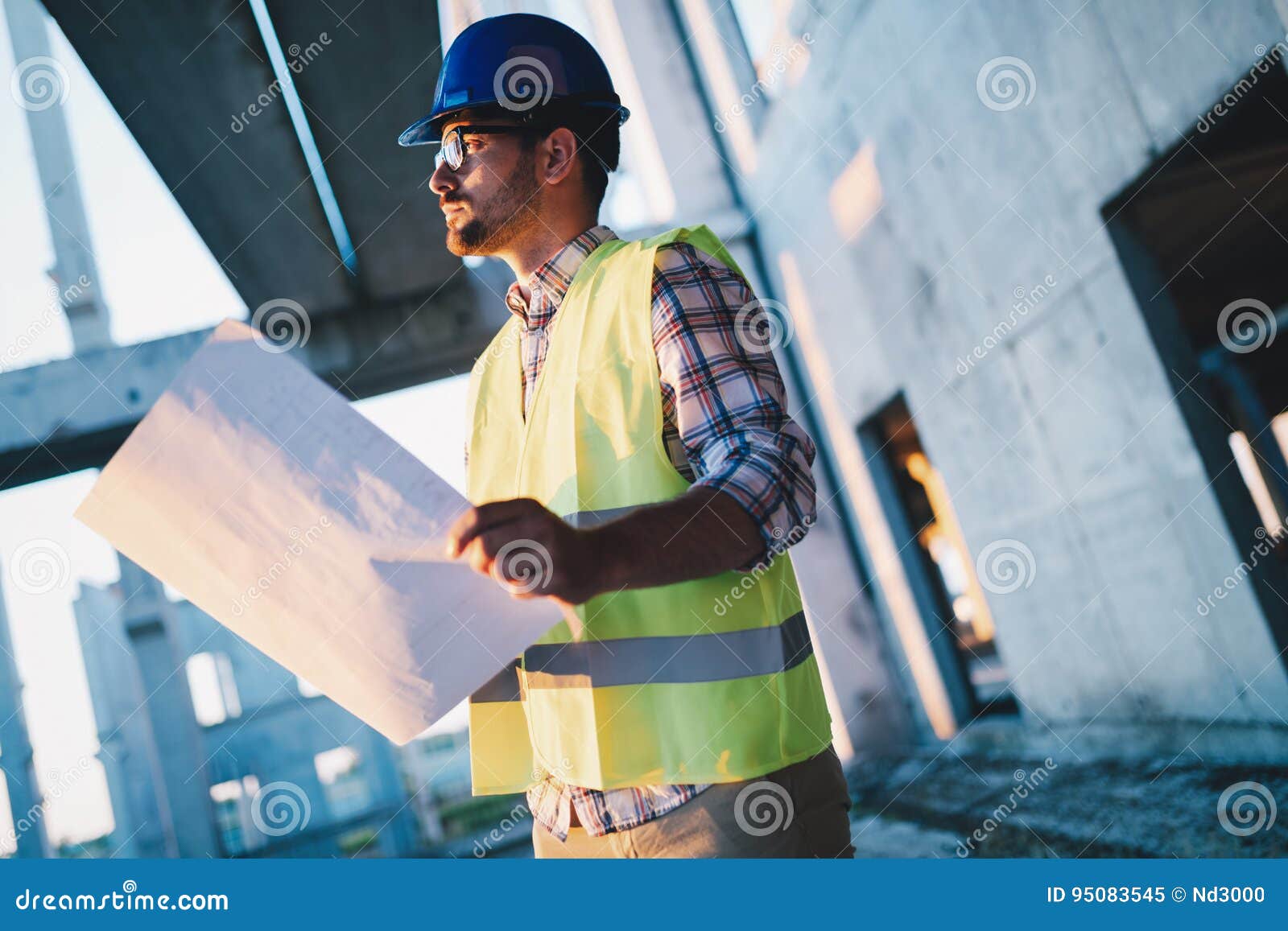 Picture of Construction Site Engineer Looking at Plan Stock Image ...